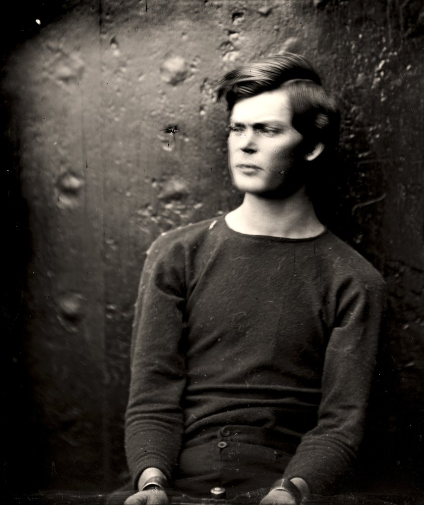 Lewis Powell in polsboeien aan boord van de USS Saugus, 1865